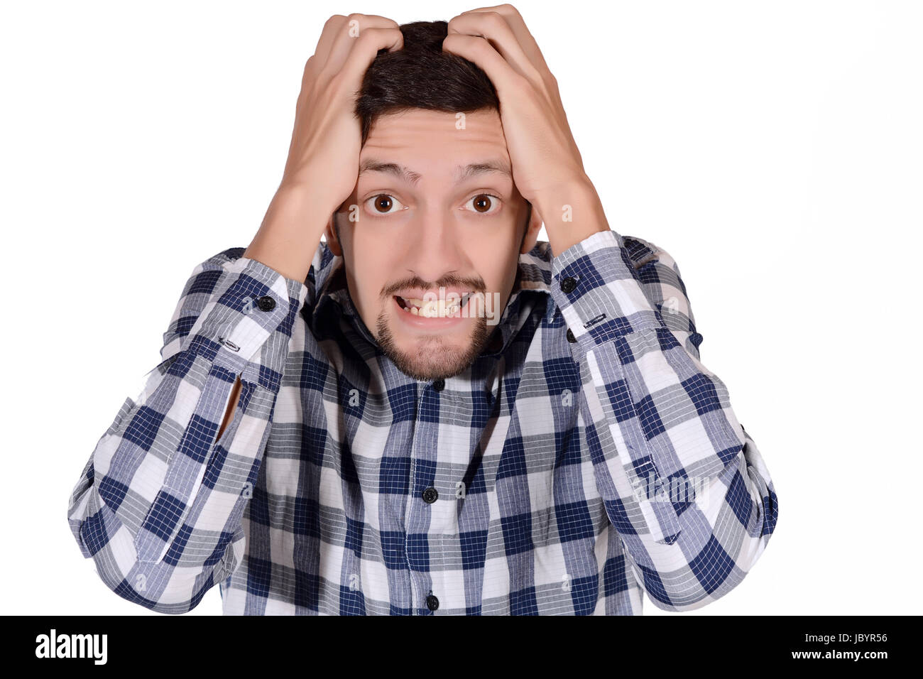 Portrait of a young man worried. Isolated white background Stock Photo ...