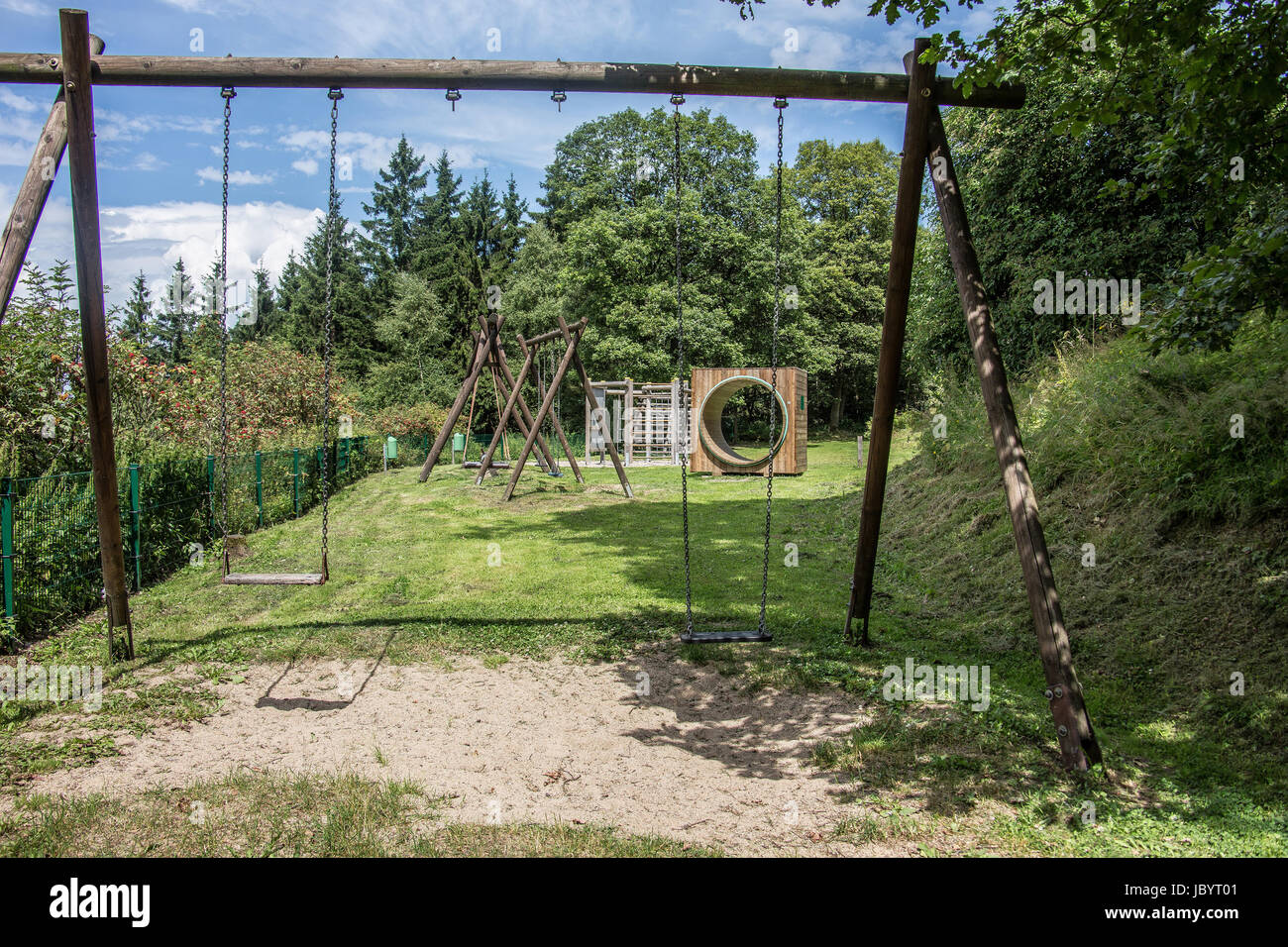 Kinderspielplatz mit Schaukeln und Wippe Stock Photo - Alamy