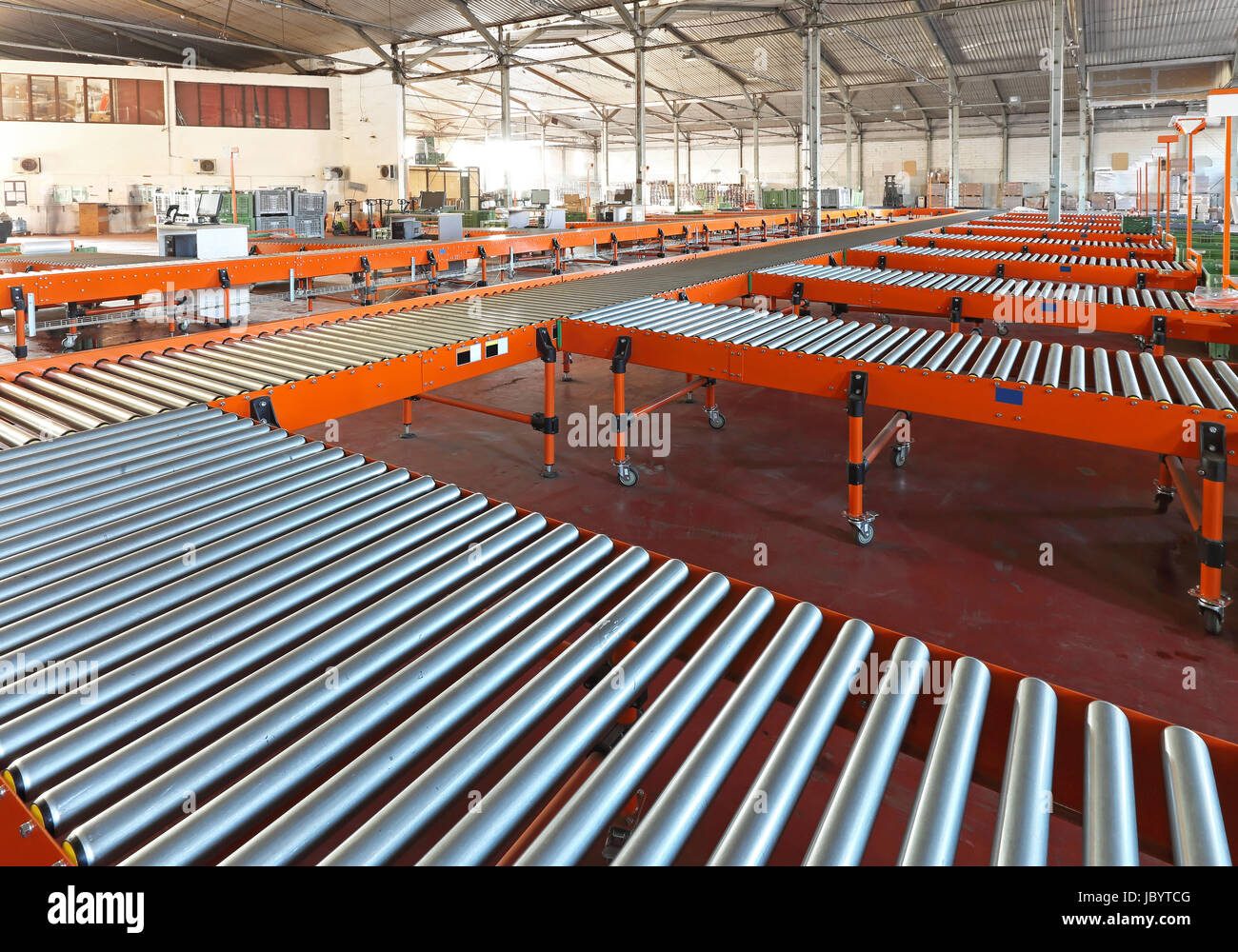 Conveyer belt system in sorting warehouse Stock Photo - Alamy