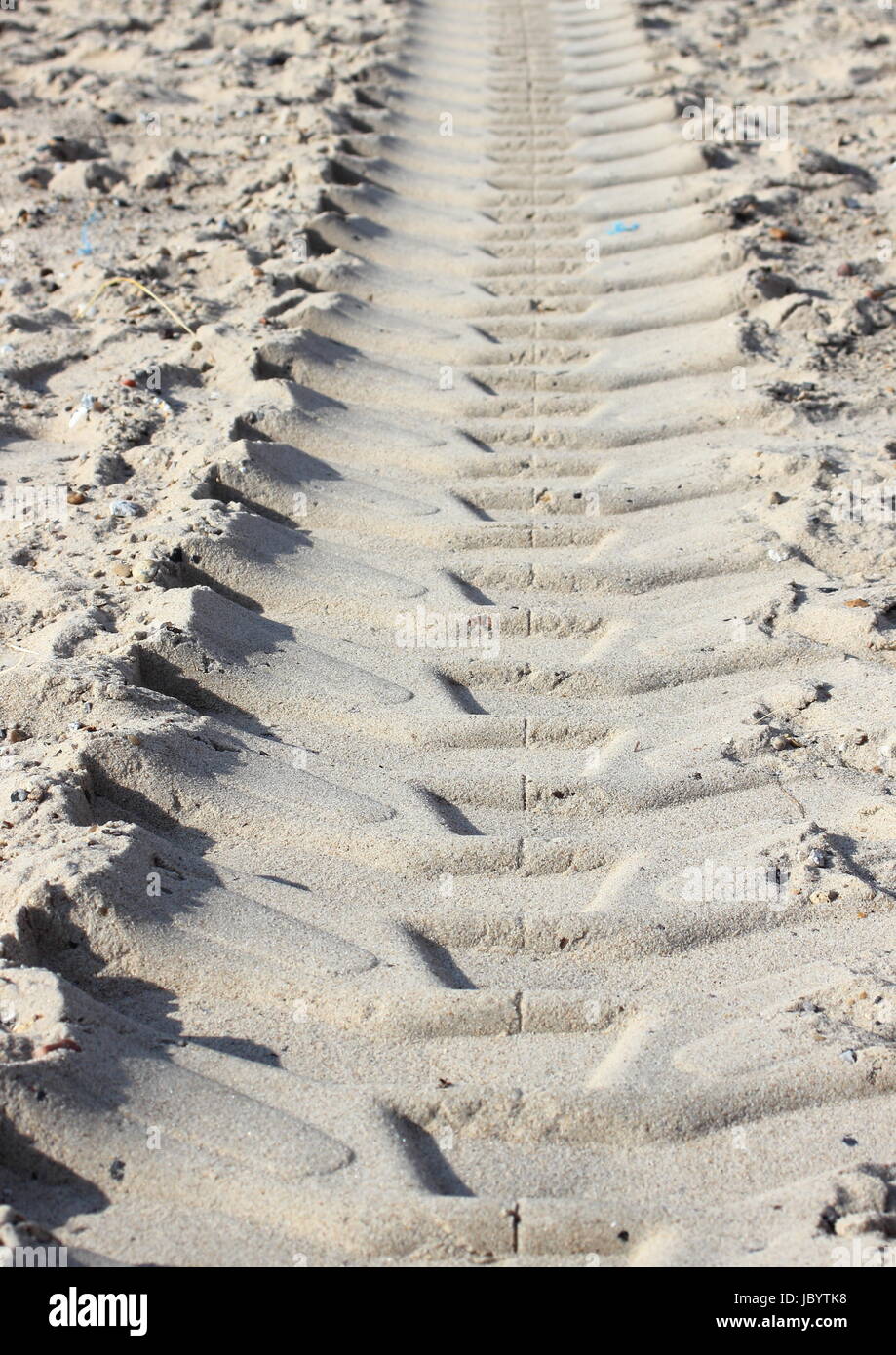 Heavy tractor track in dry beach sand in summer Stock Photo - Alamy