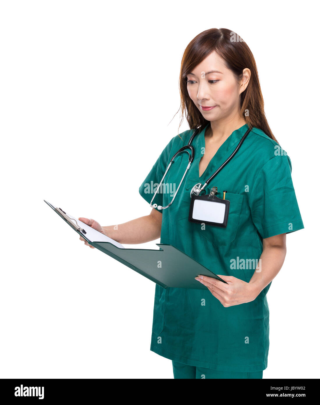 Woman doctor look at clipboard Stock Photo - Alamy