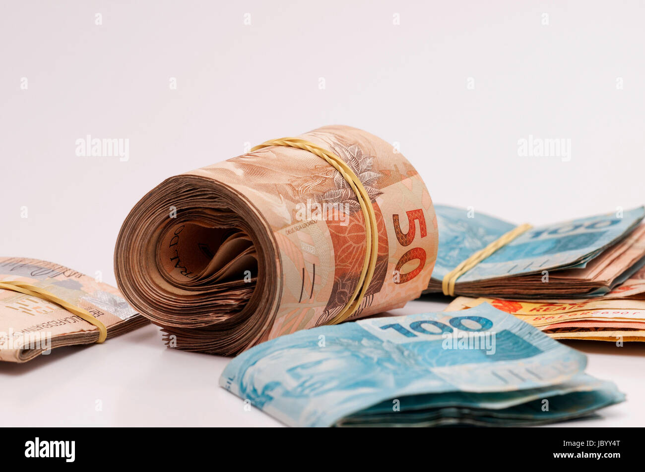A few bills of brazilian currency (real) on white background Stock ...