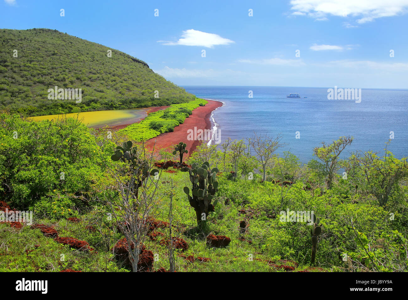 View of red beach and lagoon of Rabida Island, Galapagos National Park ...