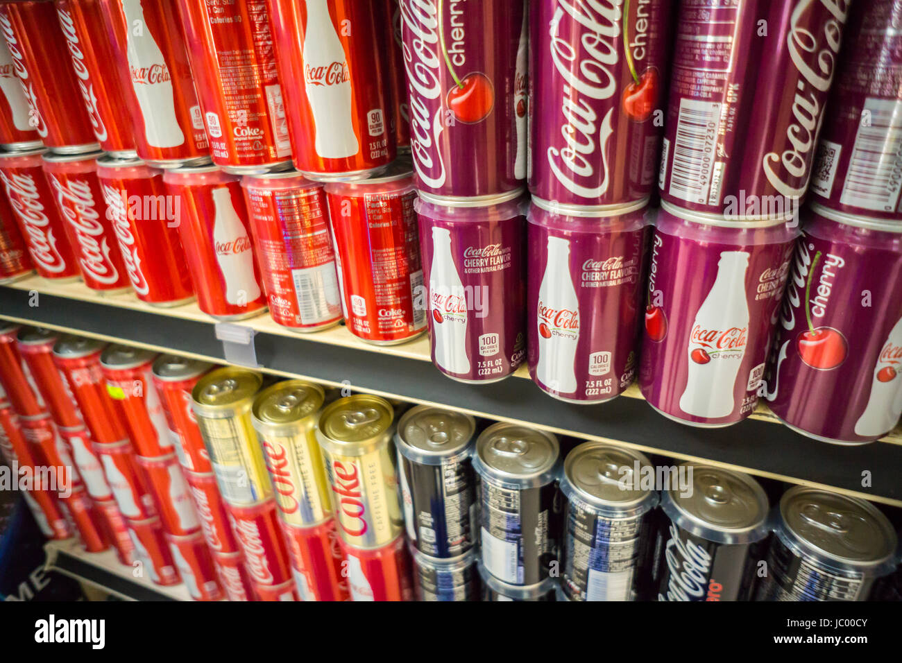 Six-packs of mini-cans of Coca-Cola in a supermarket in New York on ...