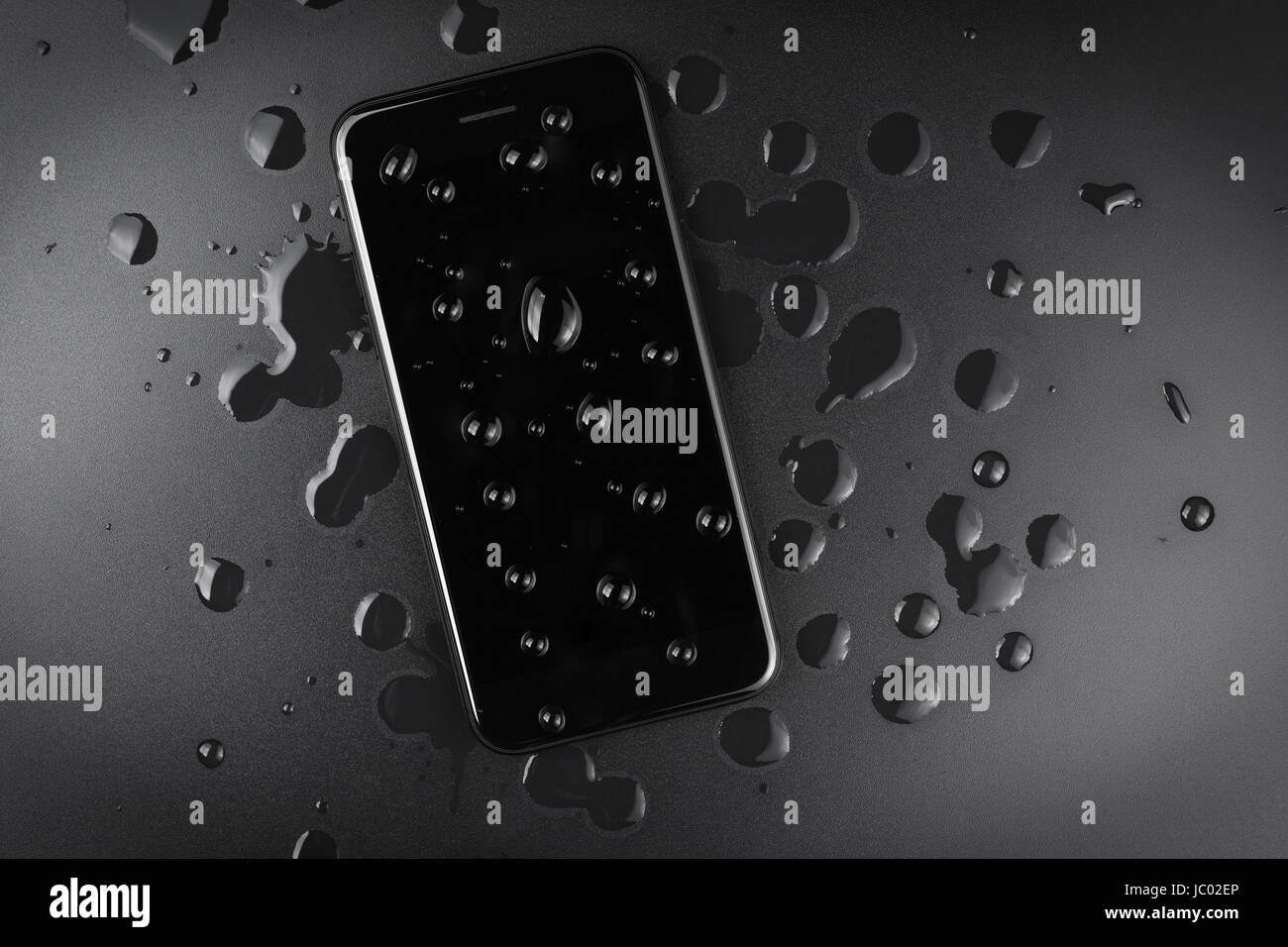 water drop on samartphone mobile on top view, waterproof phone concept ...