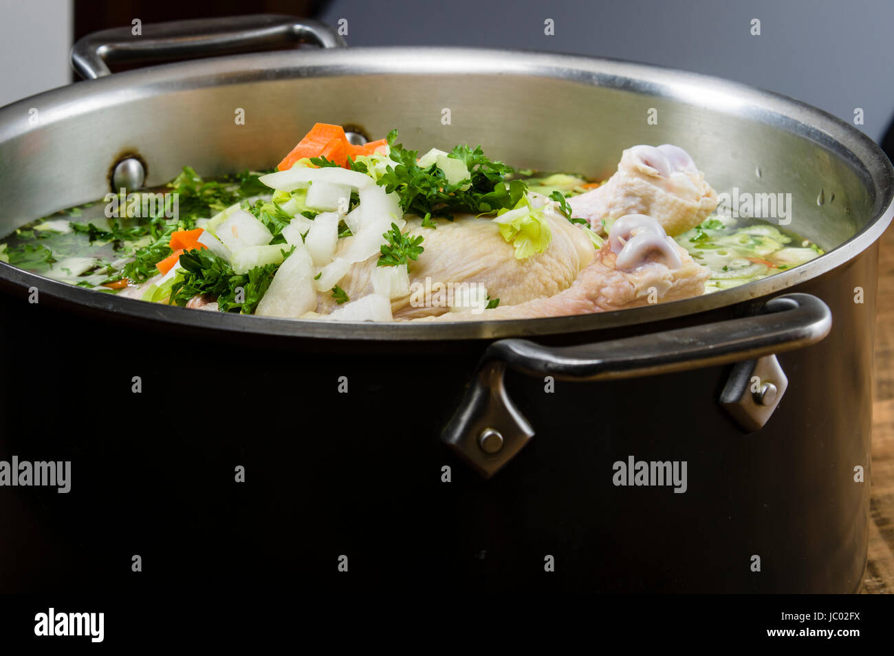 Chicken cooking in pot hi-res stock photography and images - Alamy