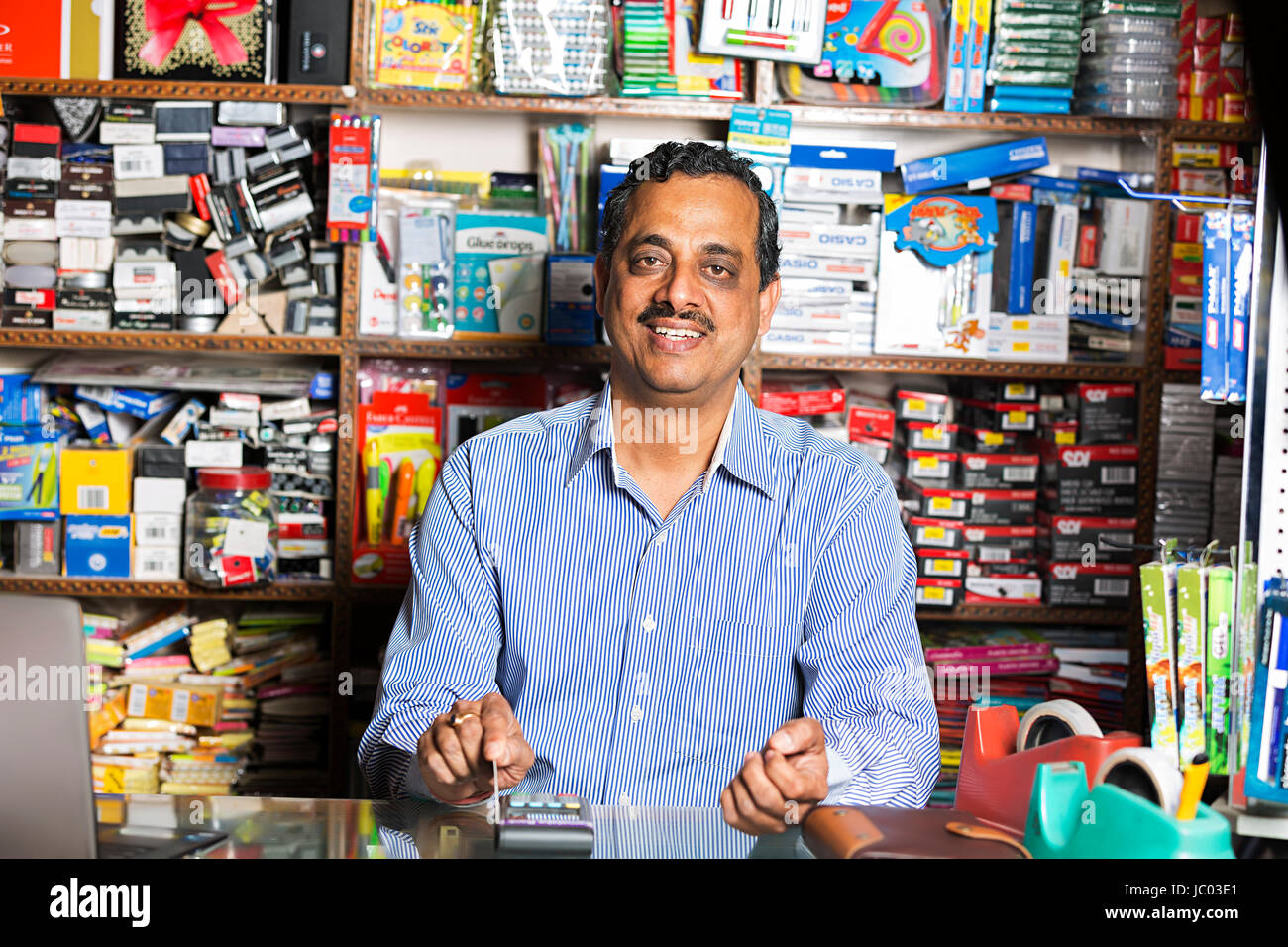 1 Indian Shop Keeper Man Credit Card Swaping On Swape machine In ...