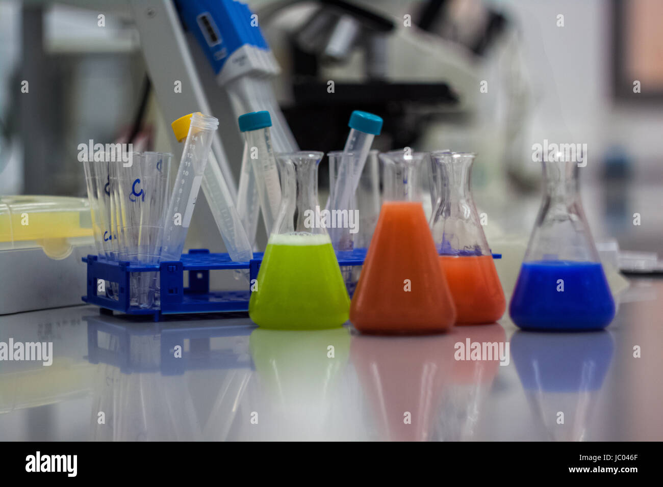 biotechnological laboratory equipment for research. Flasks, bottles and ...