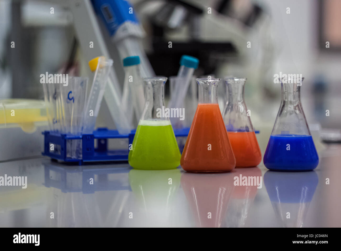 biotechnological laboratory equipment for research. Flasks, bottles and ...