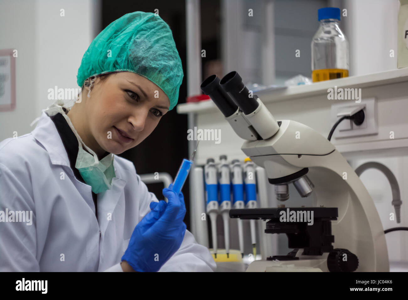 Beautiful female medical or scientific researcher or woman doctor ...
