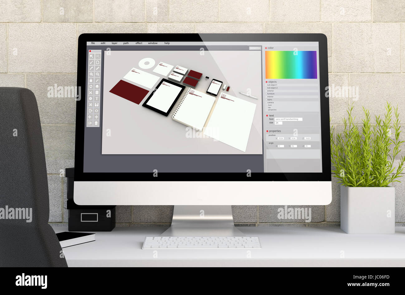 3d rendering of workspace with computer showing branding design. All ...