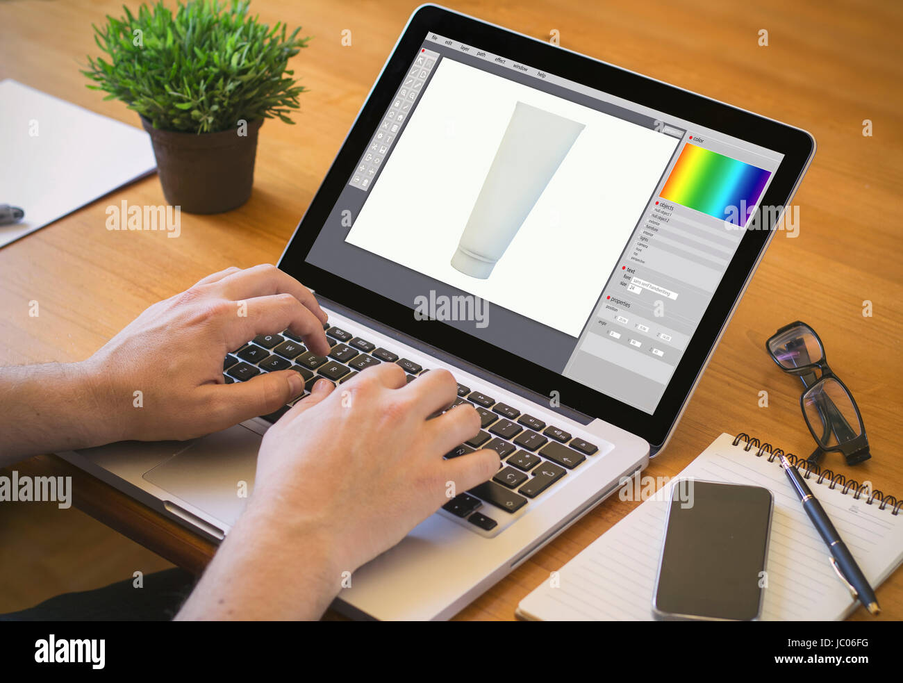 product design concept. Close-up top view of a designer working on ...