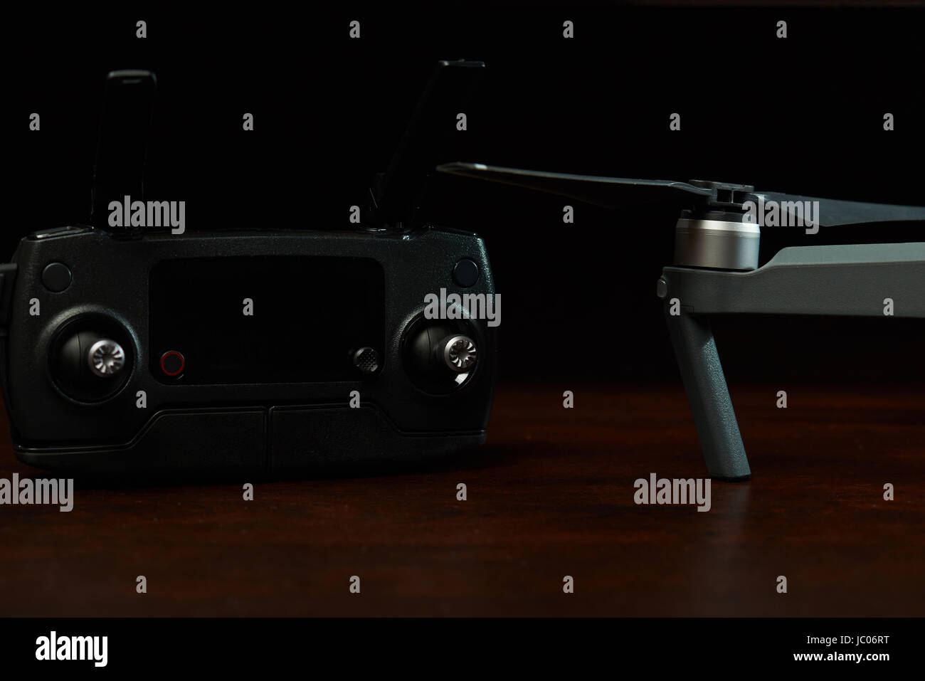 Remote controller for drone on black background. Aerial uav concept ...