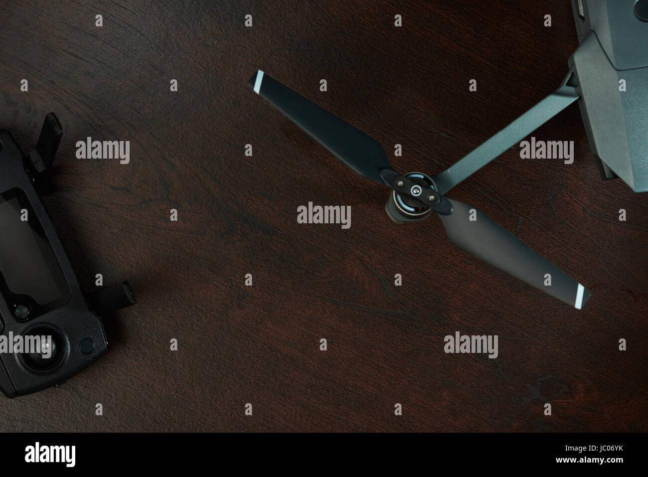 Uav drone concept lay on dark wooden table view from top Stock Photo ...
