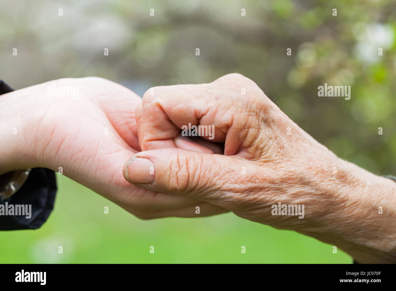 Holding old womans hand hi-res stock photography and images - Alamy