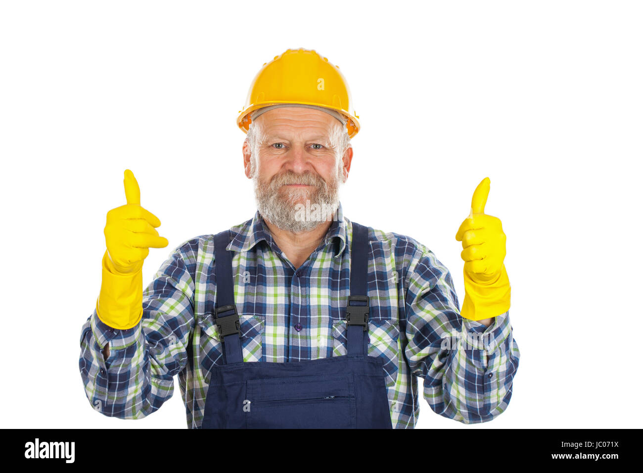 Mechanic wearing yellow construction helmet hi-res stock photography ...