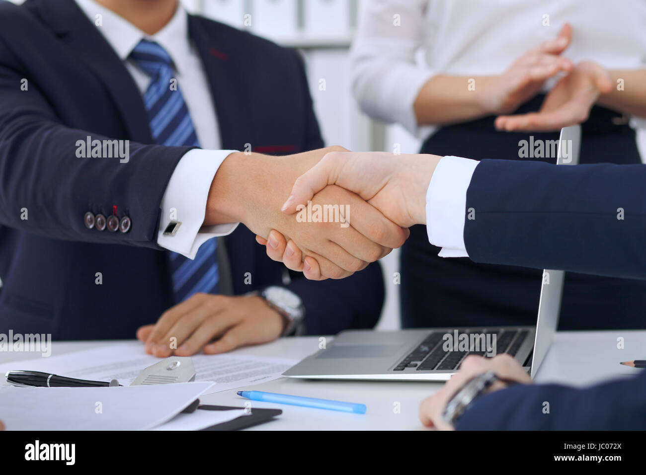 Business handshake at meeting or negotiation in the office. Partners ...