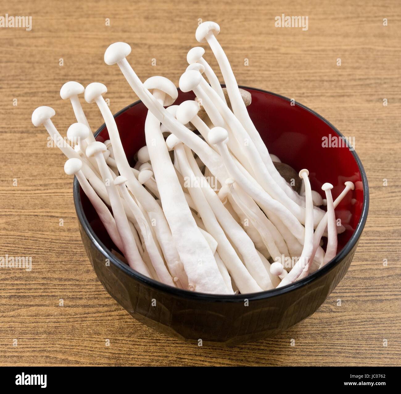 Vegetable, Raw White Shimeji Mushroom or Bunapi Mushroom in Black ...