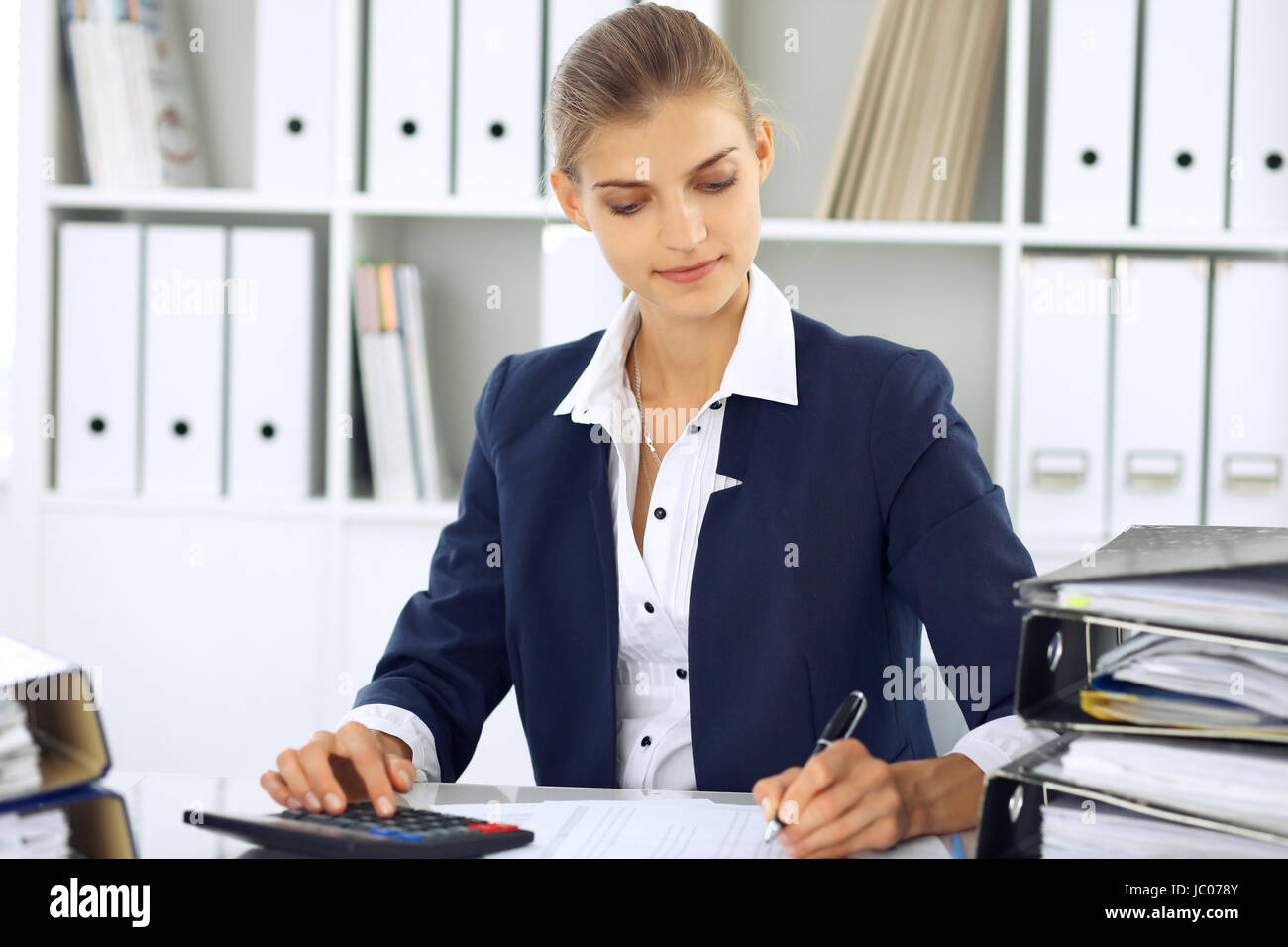 Modern business woman or confident female accountant in office. Student ...