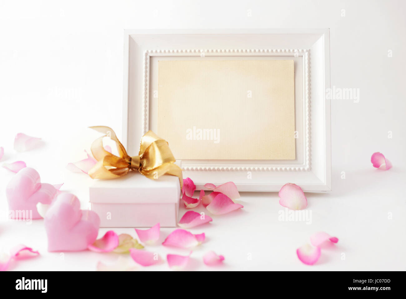 photo frame, flowers and gift box Stock Photo - Alamy