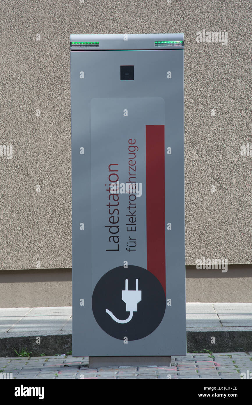 "Charging station for electric cars" written in German in the streets ...