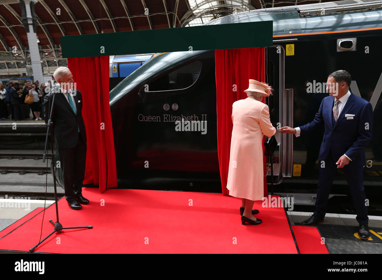 Queen Elizabeth II unveils the new livery of the train as she and the ...