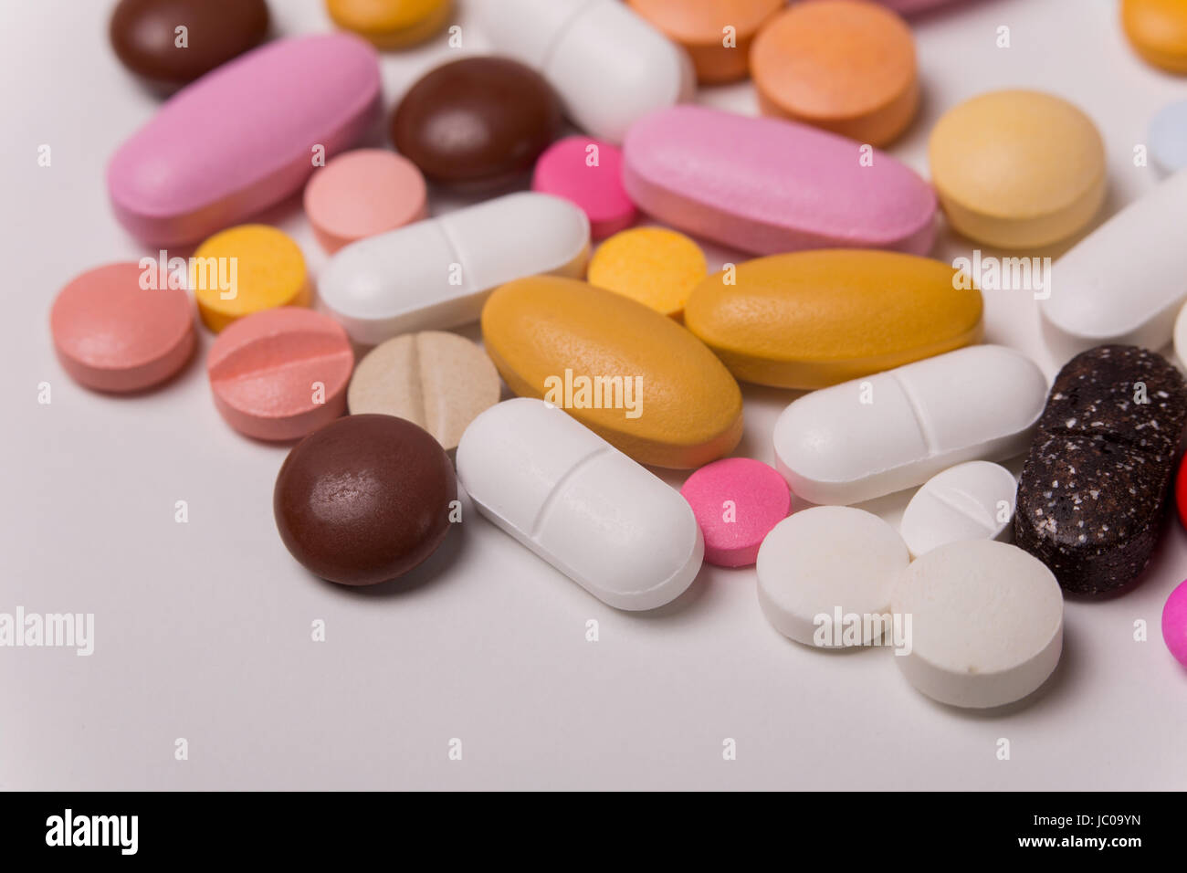 different Tablets pills capsule heap mix therapy drugs Stock Photo - Alamy
