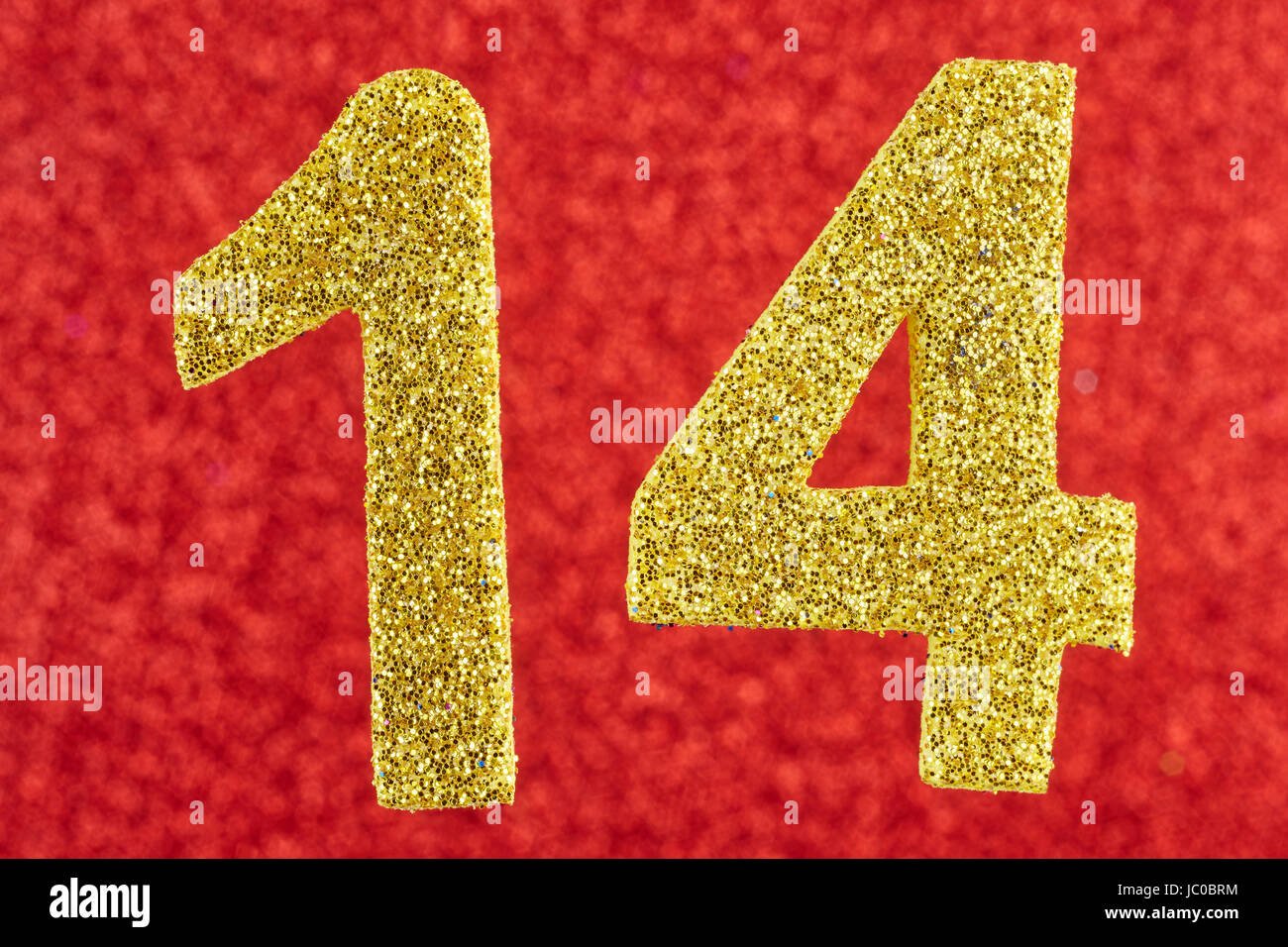 Number fourteen yellow color over a red background. Anniversary ...