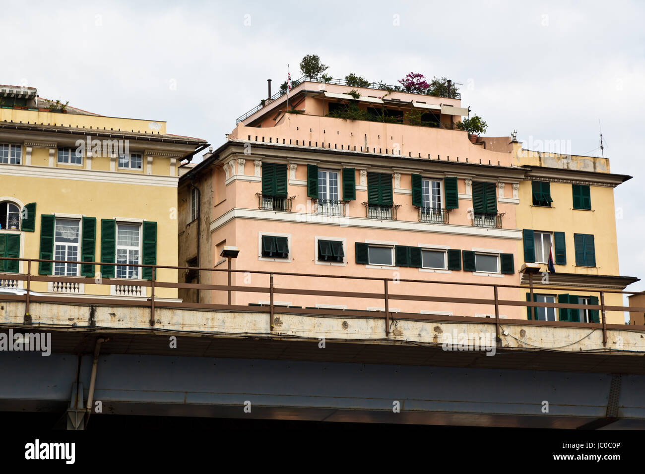 Yellow House with Trees on the Roof in Genoa, Italy Stock Photo - Alamy