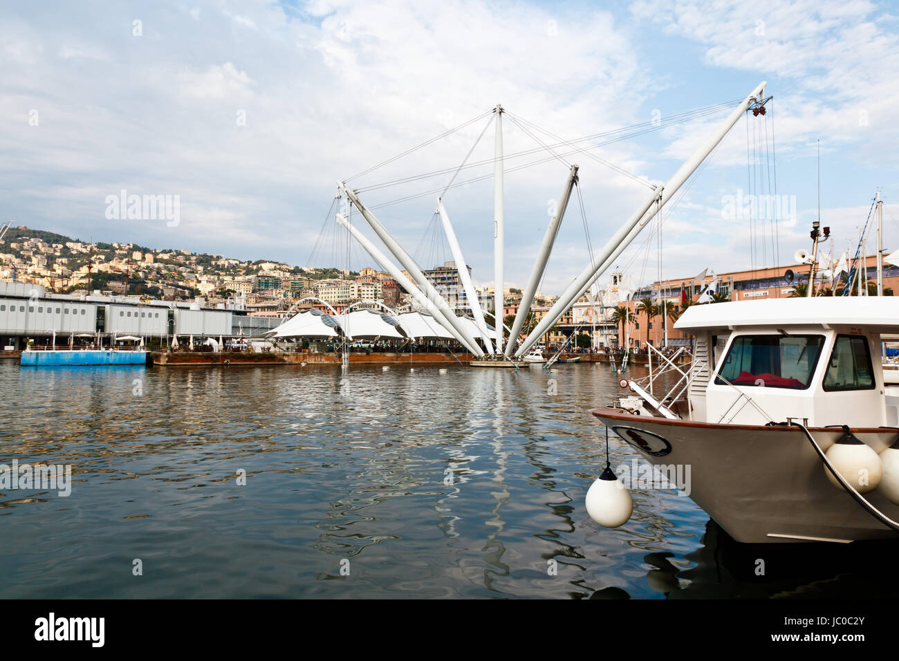 Genova Old Port Harbor with White Boat In a Cloudy Day, Italy Stock ...