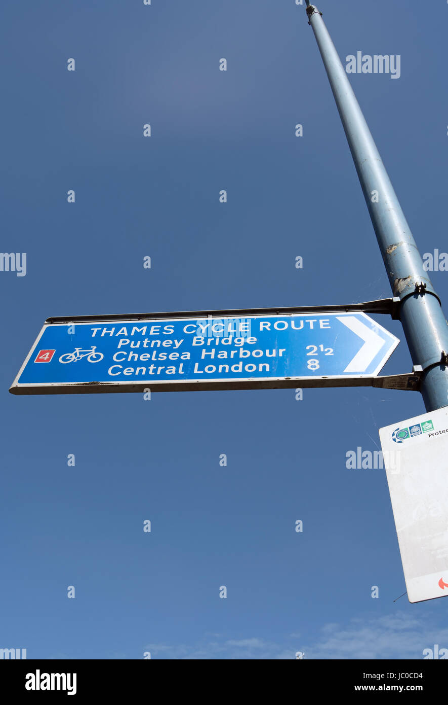 right pointing cycle route sign giving directions and distances to ...