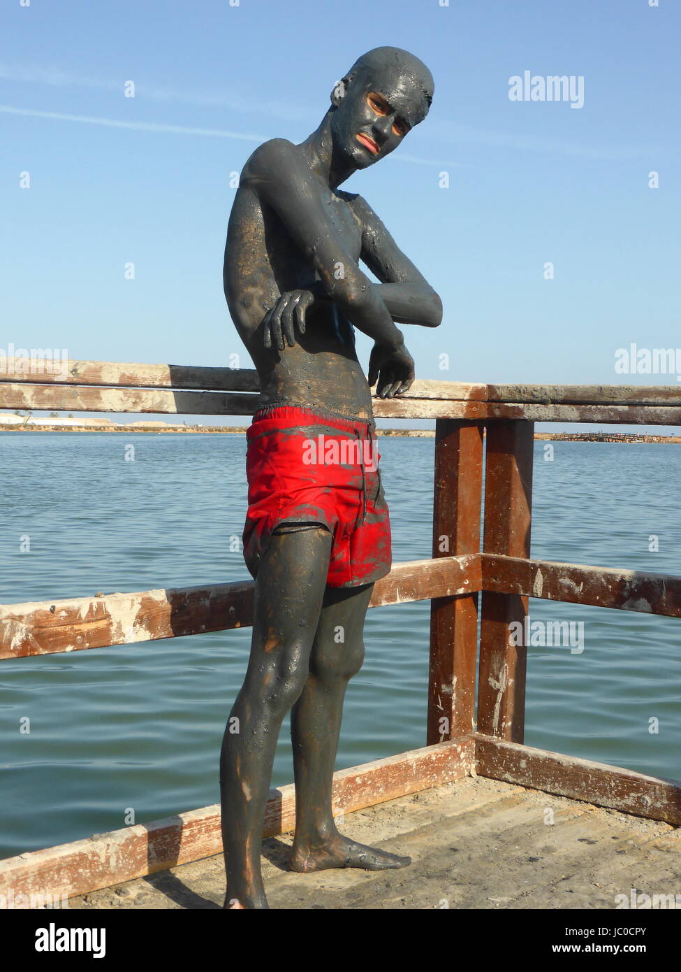 Result of applying mud bath throughout the body Stock Photo - Alamy
