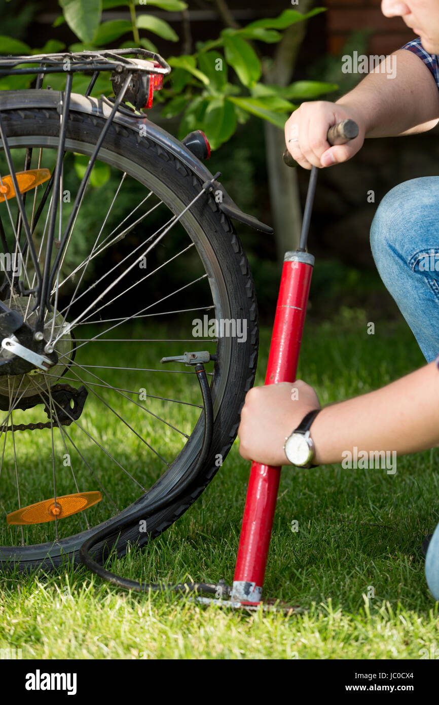 Pumping up bicycle wheel hi-res stock photography and images - Alamy