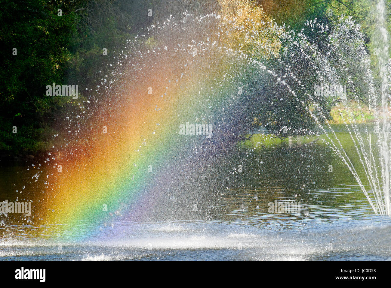 rainbow through water jet Stock Photo - Alamy
