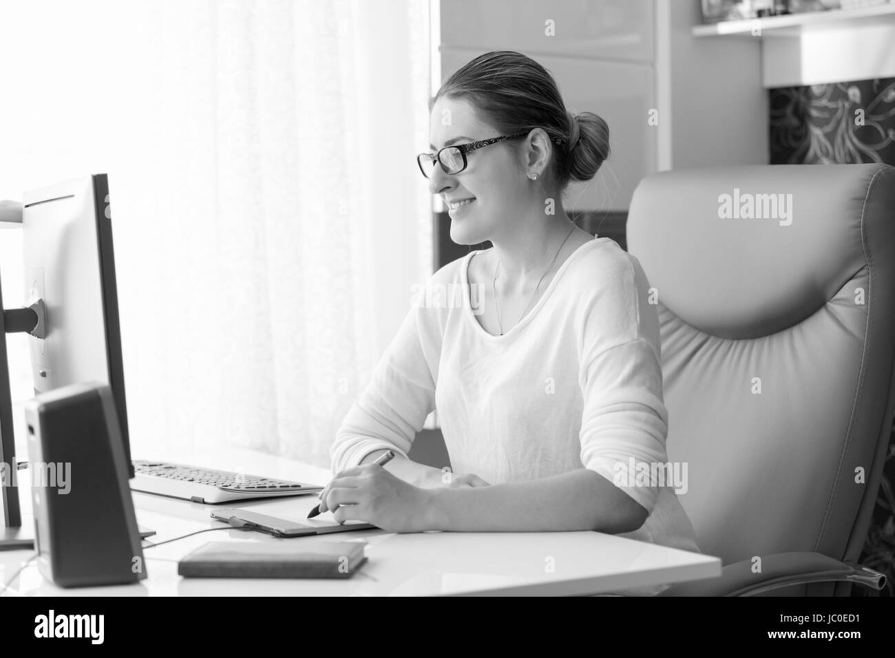 Female designer working Black and White Stock Photos & Images - Alamy