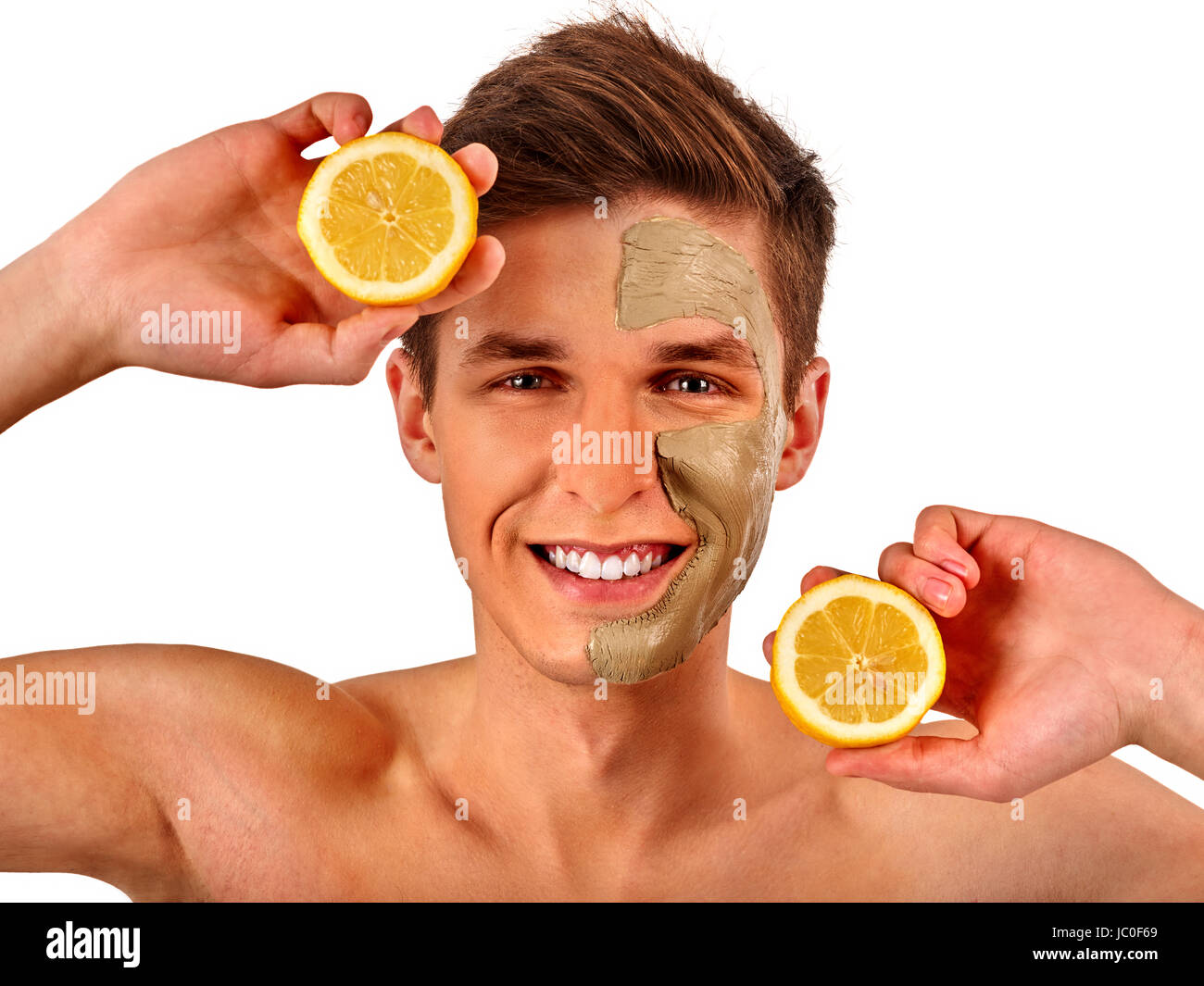 Facial mask from fresh fruits and clay for man concept. Face with ...