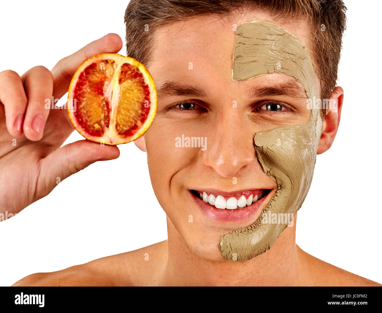 Facial mask from fresh fruits and clay for man concept. Face with ...