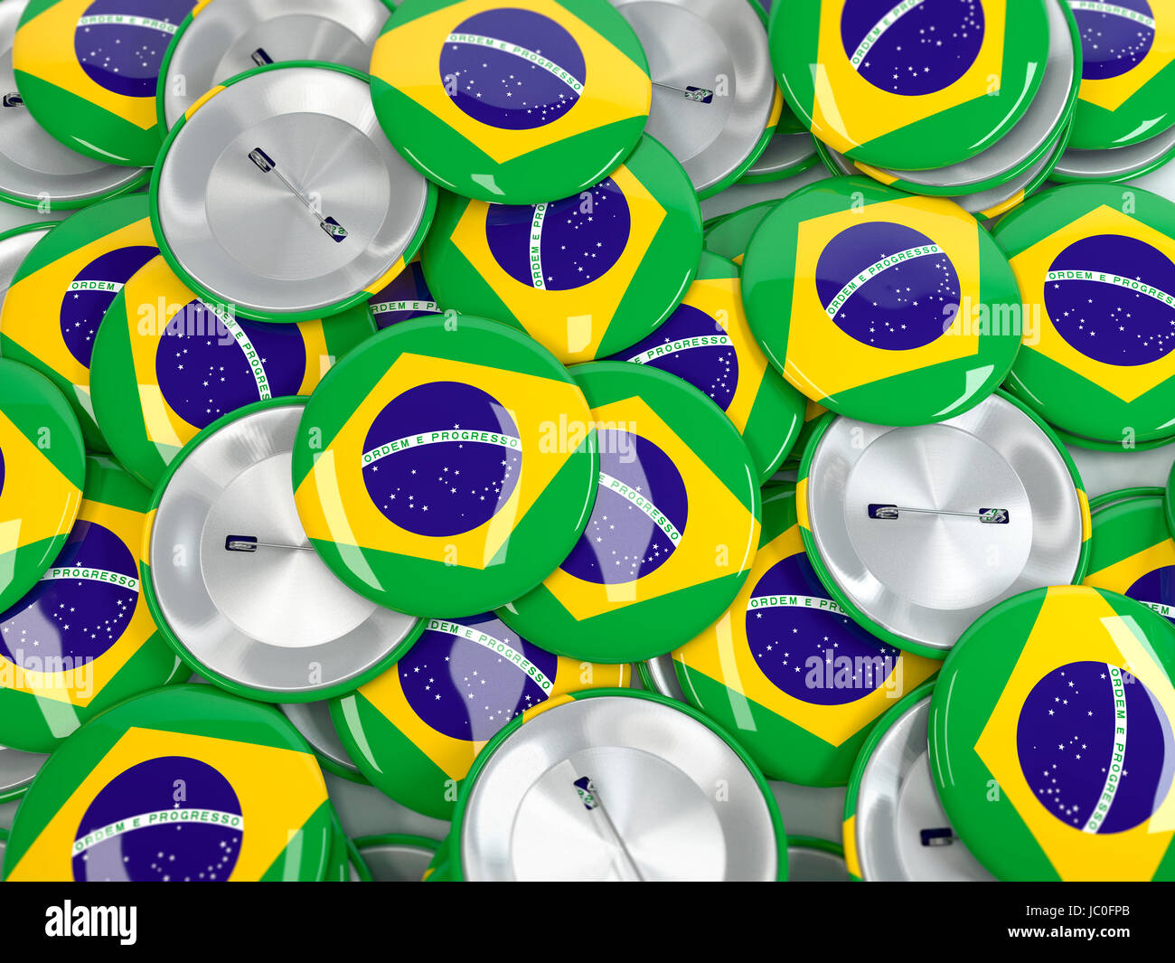 View from above on stack of button badges with flag of Brazil ...