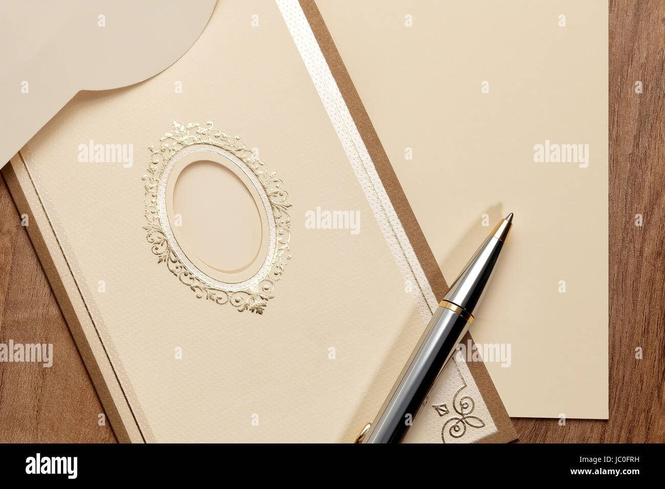 Vintage card with pen Stock Photo - Alamy