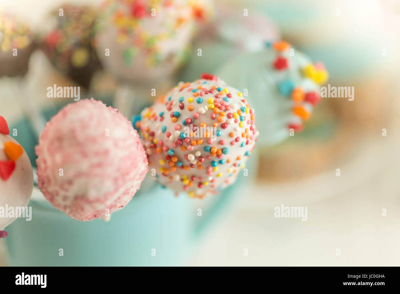 Macro shot of beautiful cake pops decorated by colorful sprinkles Stock ...
