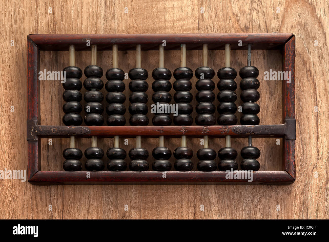 Old abacus on wooden table Stock Photo - Alamy