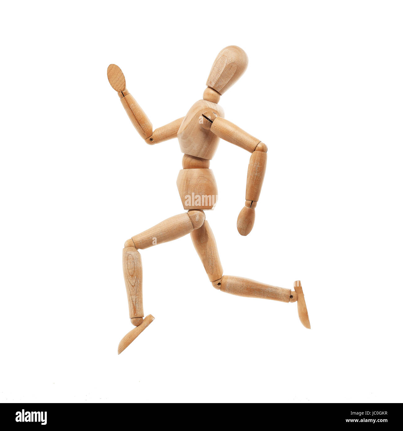 Wood model with running pose isolated on white background Stock Photo ...