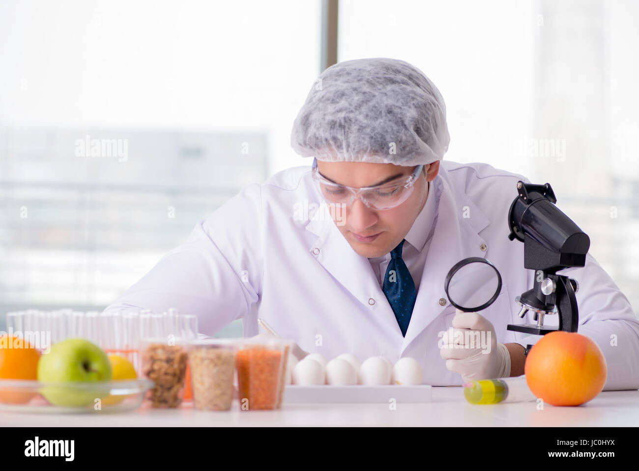 Nutrition expert testing food products in lab Stock Photo - Alamy