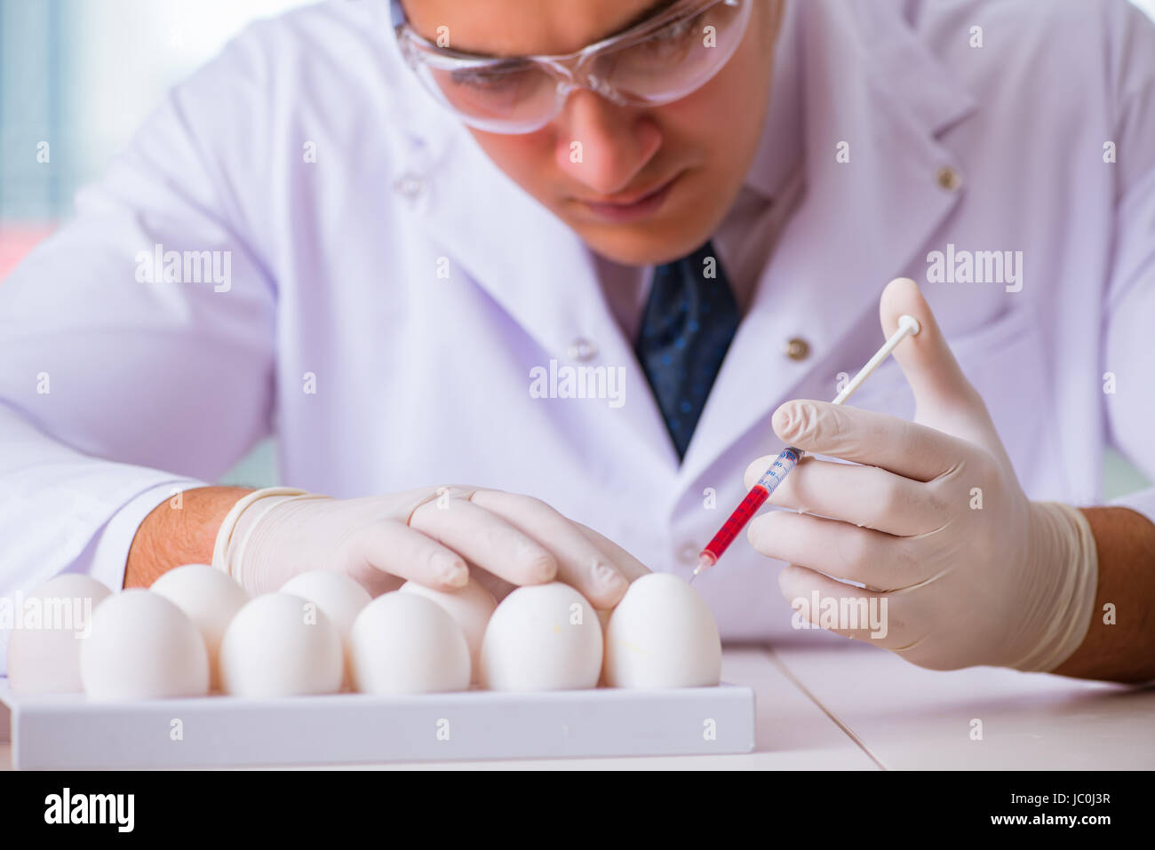 Nutrition expert testing food products in lab Stock Photo - Alamy