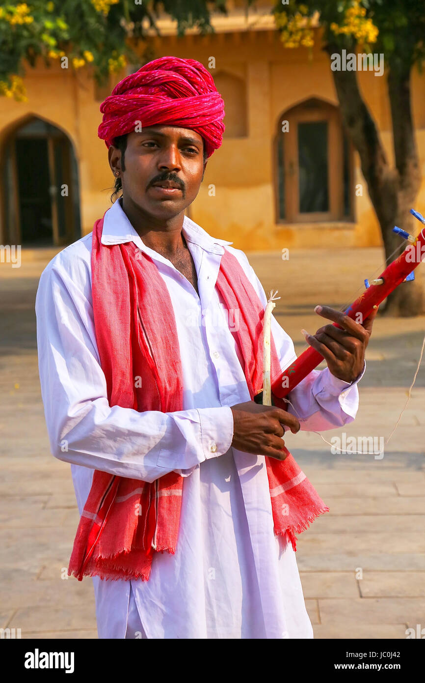 Local man playing ravanahatha in Jaleb Chowk, Amber Fort, Rajasthan ...