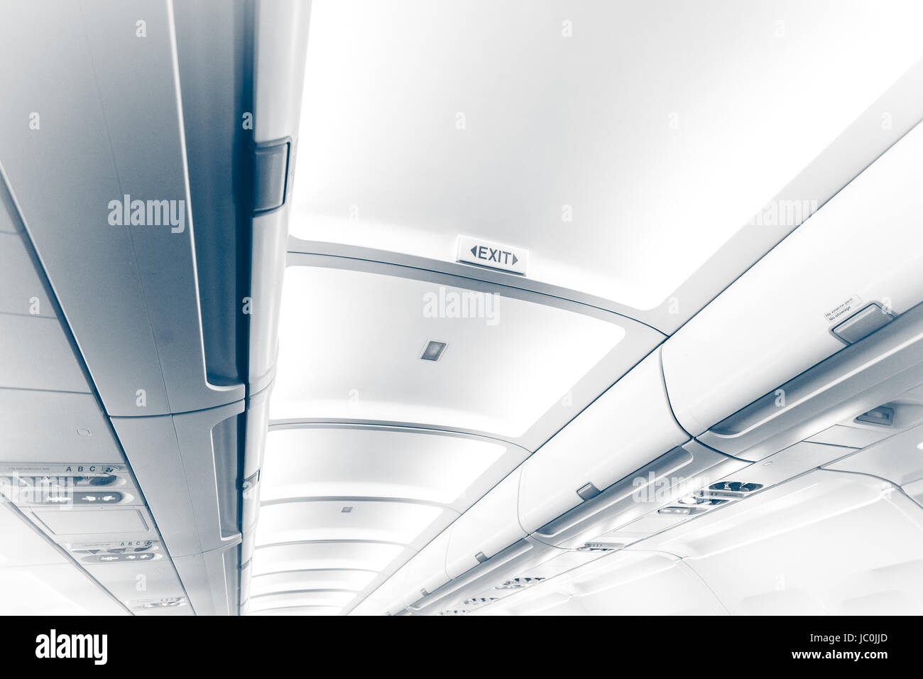 Airplane cabin interior exit sign hi-res stock photography and images ...