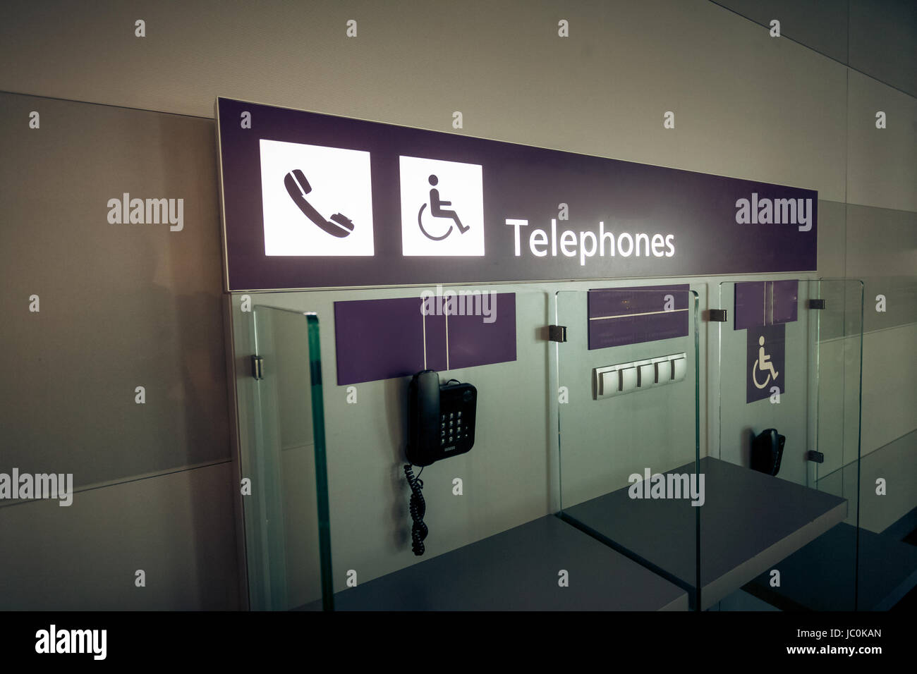 Closeup view of telephones in airport terminal Stock Photo - Alamy