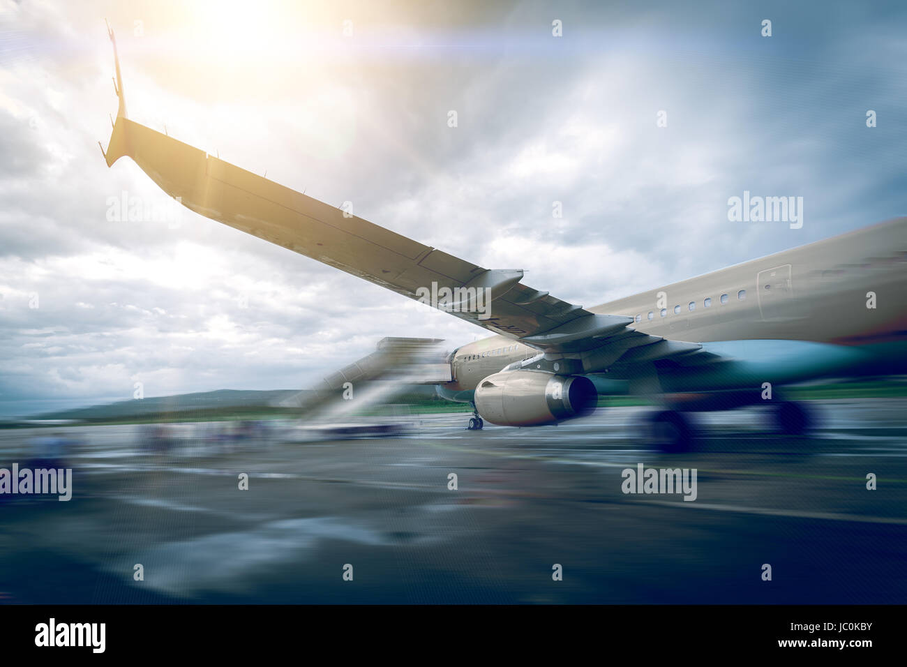 Plane take off landing sunny day blue sky and sun hi-res stock ...