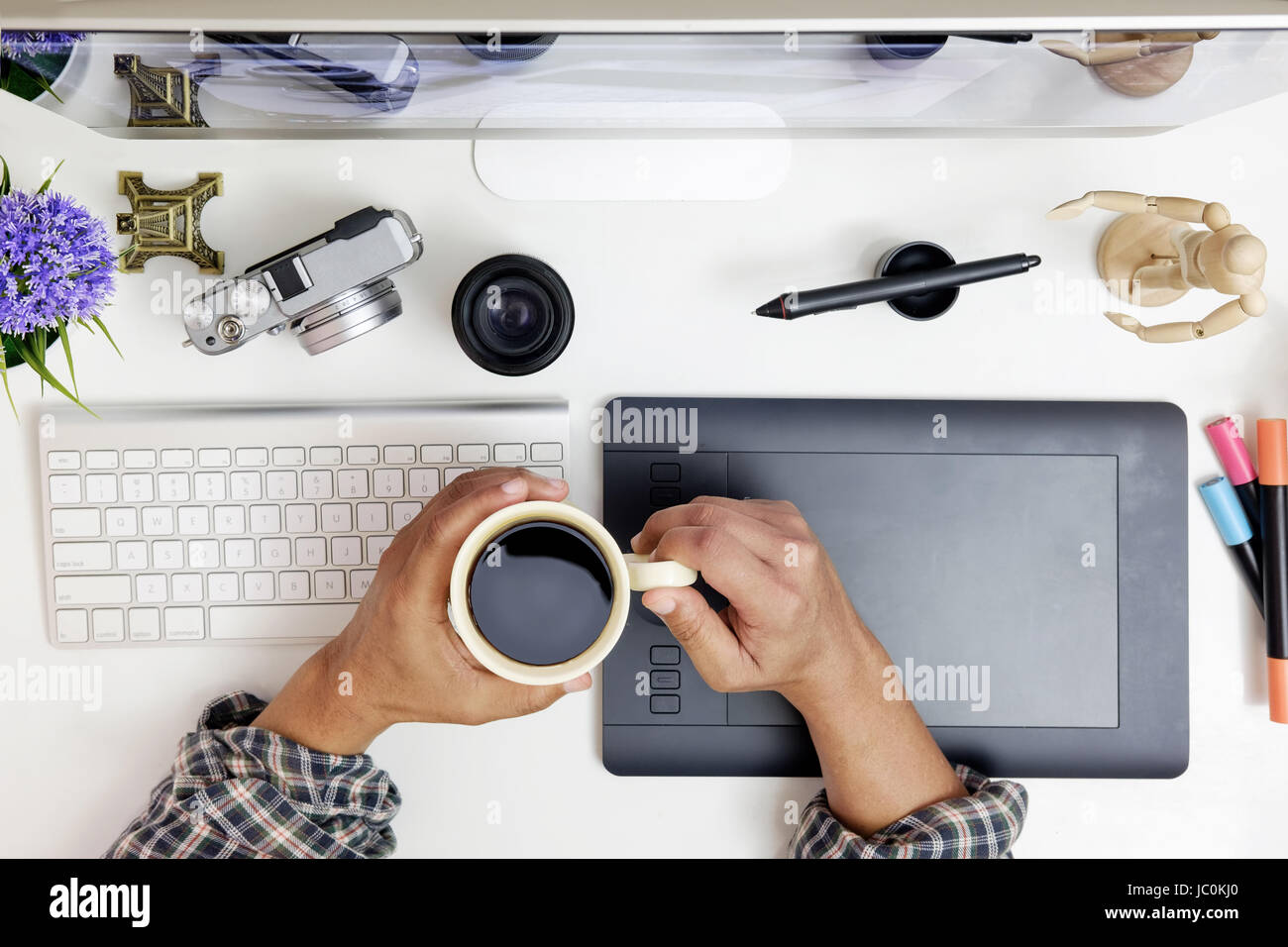 Designer desk , Designer hand holding coffee break , Stylish workspace ...