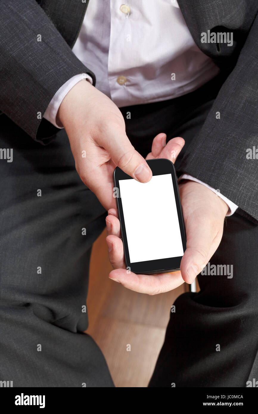 above view of touchscreen smartphone with cut out screen in male hands ...